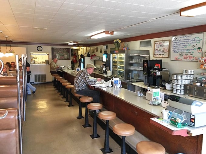 The classic diner interior at Bud's features the counter seating that separates casual diners from serious breakfast aficionados. Choose wisely.
