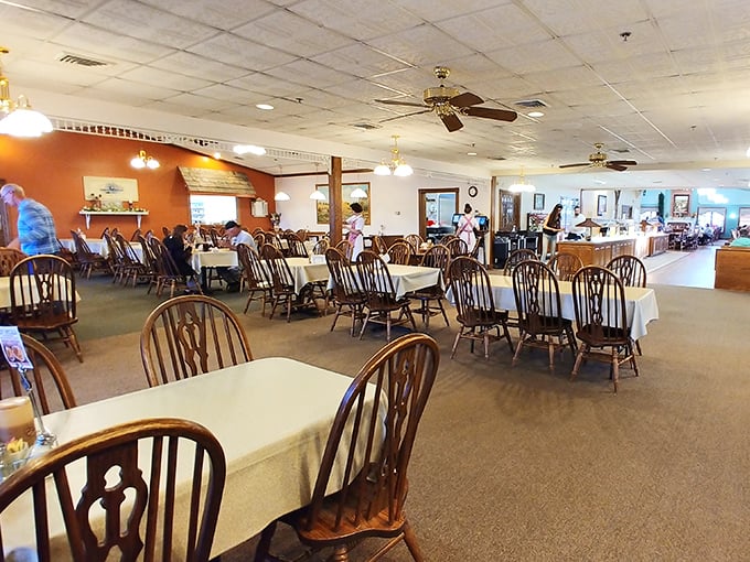 Wooden Windsor chairs and white tablecloths create that rare dining atmosphere where you feel both special and completely at home.