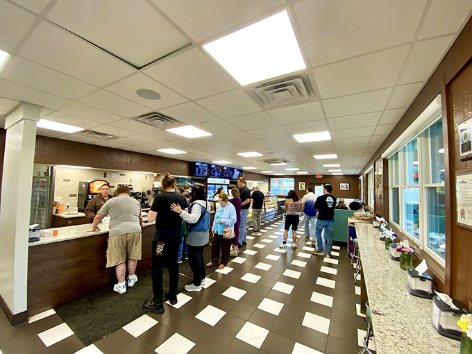 The line forms with purpose&mdash;a donut democracy where everyone waits their turn for a taste of Centerville's sweetest tradition.