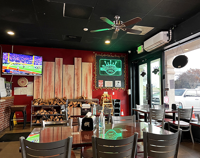 Inside, the wood-stacked walls and glowing neon aren't just d&eacute;cor &ndash; they're a promise of authenticity. That pile of firewood isn't for show, folks.