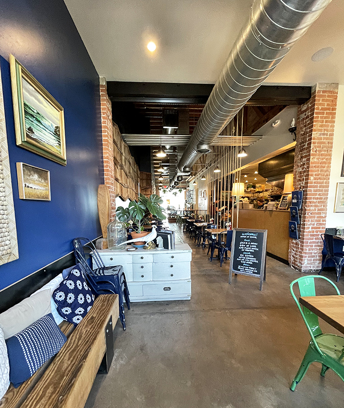 Step inside and the navy blue walls, exposed brick, and industrial touches create that perfect "I've discovered something special" feeling that breakfast enthusiasts live for.