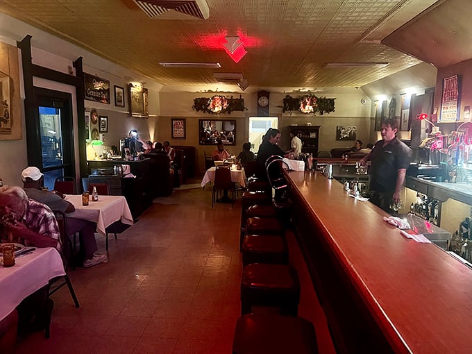 Step into Jack's cozy dining room where red vinyl booths whisper stories of countless perfect meals.