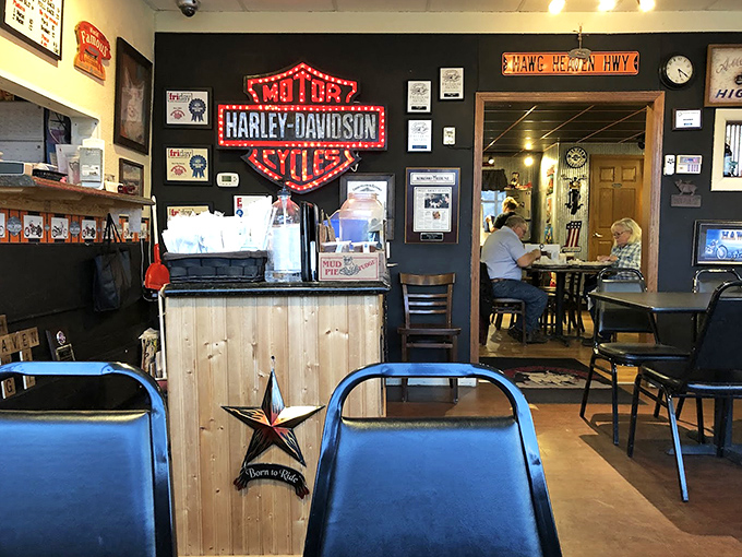 Inside, motorcycle culture meets meat worship under the glow of a Harley-Davidson sign that's seen more barbecue dreams come true than most wedding officiants.