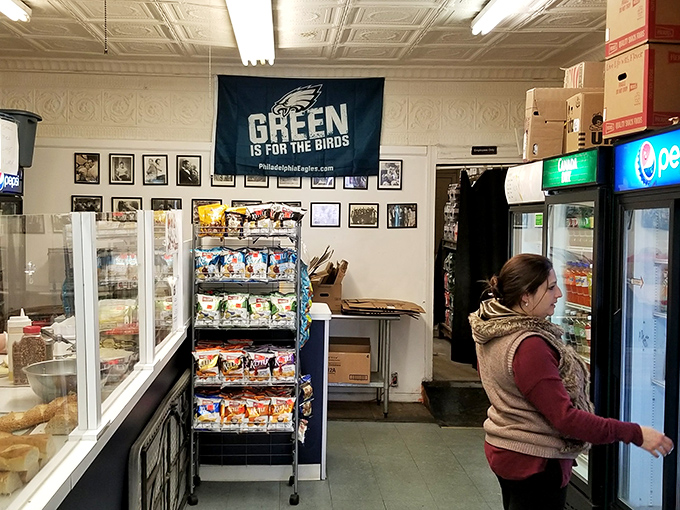 Inside, the "Green is for the Birds" Eagles banner confirms you're in authentic Philly territory, where sports loyalty and sandwich craftsmanship go hand in hand.
