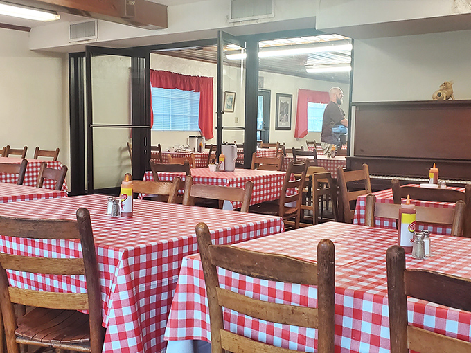 Red and white checkered tablecloths: the universal signal that you're about to experience comfort food that doesn't need fancy surroundings to impress.