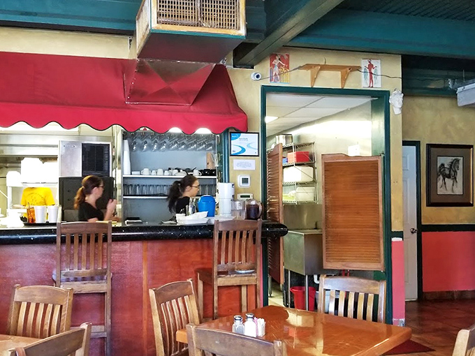 Inside, the cozy dining area feels like you've stumbled into someone's cherished family kitchen rather than a restaurant. Comfort trumps pretension here.