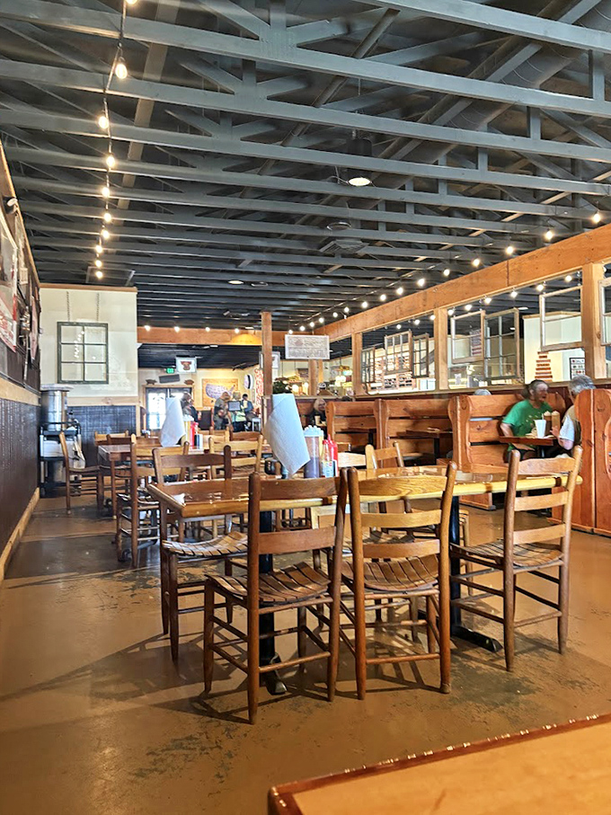 Wooden chairs and exposed beams create that perfect "come as you are" atmosphere where napkins are necessities, not accessories.