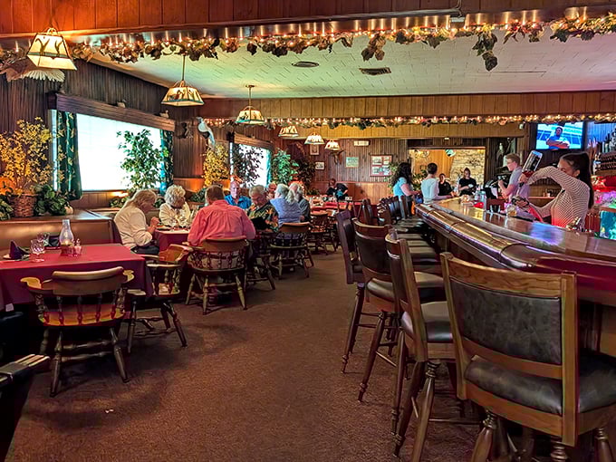 Where time stands still but Old Fashioneds flow freely. The warm wood paneling and Tiffany-style lamps create the quintessential supper club ambiance that money can't manufacture.