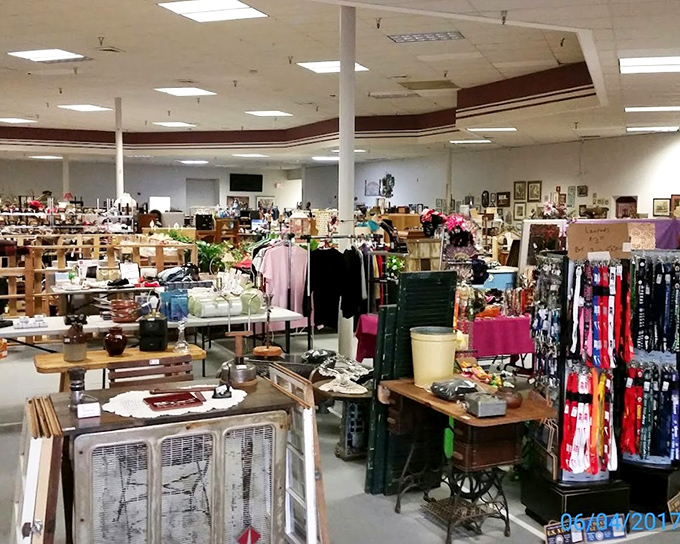 A treasure hunter's paradise unfolds under fluorescent lights, where every aisle leads to another decade and forgotten memories wait to be rediscovered.