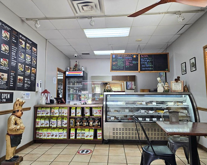 Where culinary dreams come true! The display case beckons with promises of European delights while the menu board teases possibilities that'll have you planning return visits.