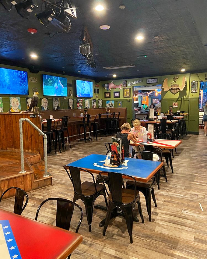 Inside, green walls adorned with local art and fishing memorabilia create the perfect backdrop for seafood indulgence. The kind of place where calories don't count and stories flow freely.