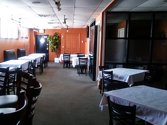 Inside, warm terracotta walls and crisp white tablecloths create the perfect backdrop for culinary magic. It's like dining in someone's well-loved home rather than a restaurant.