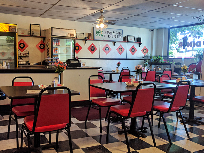 Classic diner aesthetics at their finest&mdash;red vinyl chairs, checkered floors, and that unmistakable counter where breakfast dreams come true.