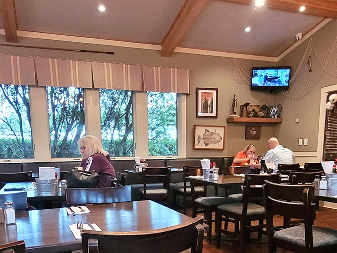 Simple wooden tables and large windows create that perfect "I've discovered something special" atmosphere locals have treasured for years.