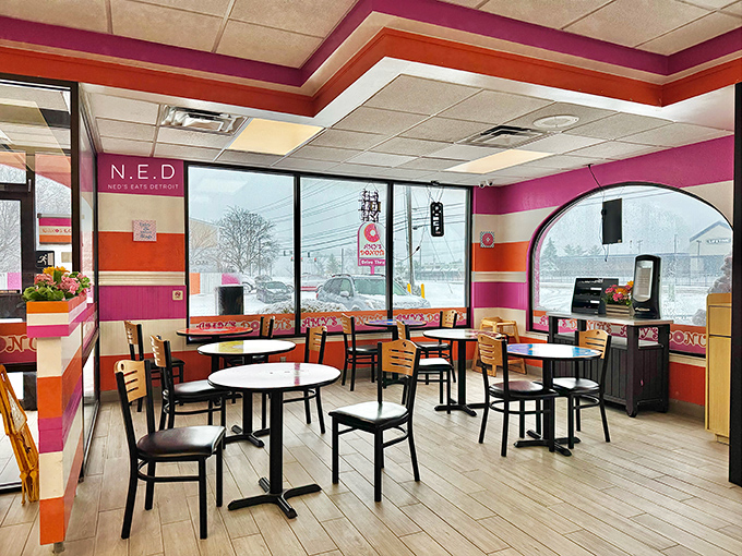 Inside, the cheerful stripes continue, creating a playful atmosphere where calories don't count and coffee refills fuel donut-fueled conversations.