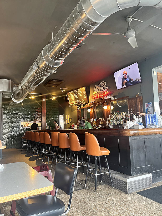 Mid-century modern meets Milwaukee cool at Comet's bar. Those orange stools have witnessed countless first dates, celebrations, and "I needed this" moments.