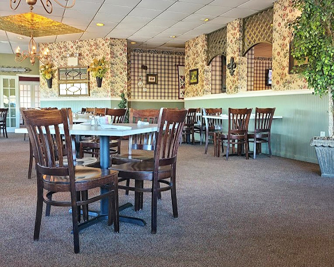 Floral wallpaper meets mint wainscoting in a marriage of design elements that somehow works perfectly—like mashed potatoes and gravy, some combinations just make sense.