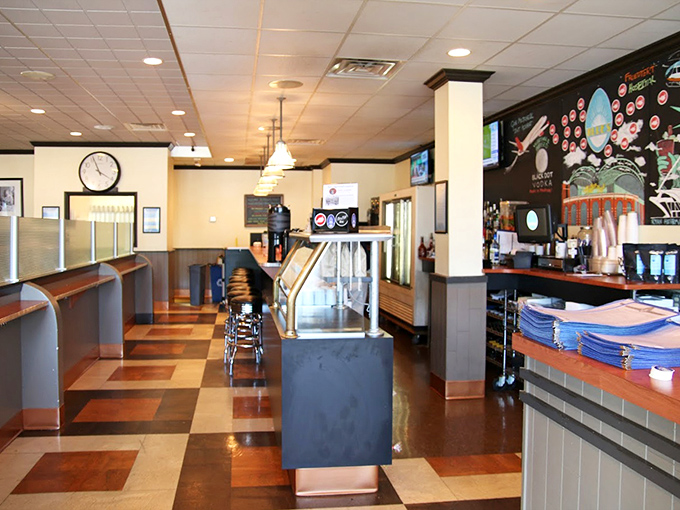 The classic checkered floor and warm wood tones create that perfect "fancy but not fussy" vibe where both grandma and your hipster nephew feel equally at home.