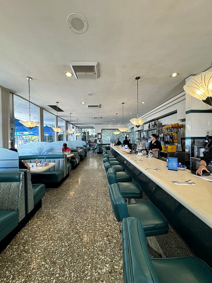 Step inside to a mid-century time capsule where teal booths and terrazzo floors have witnessed countless coffee refills and "just one more bite" moments.