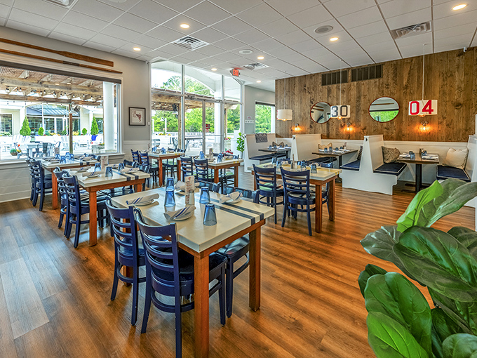 Warm wood tones and nautical blues create the perfect backdrop for seafood feasting. The dining room balances coastal charm with modern comfort&mdash;no kitschy fishing nets in sight!