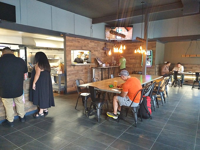 Inside, warm wood accents and industrial-chic seating create that perfect "third place" vibe&mdash;somewhere between your kitchen and that fancy brunch spot downtown.