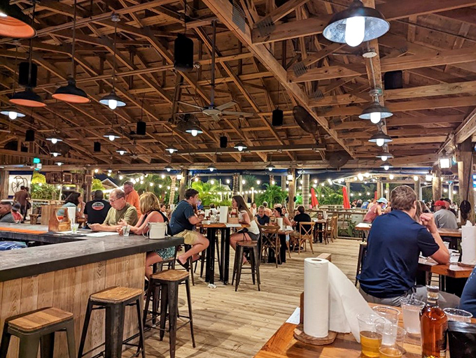 Where exposed wooden beams frame conversations as perfectly as they frame the Tampa Bay sunset&mdash;Florida dining in its natural habitat.
