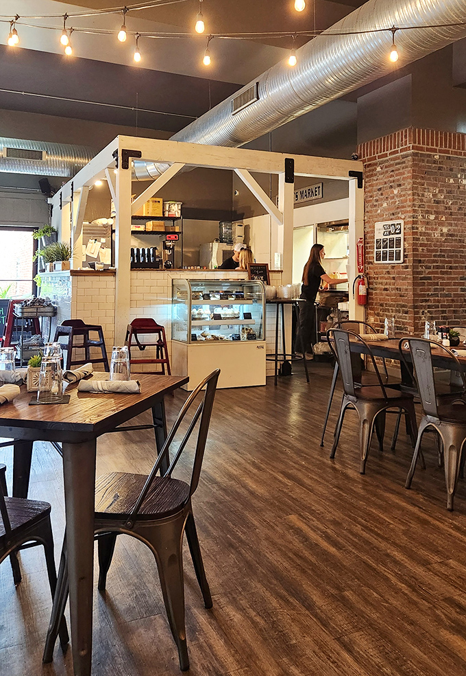 Step inside and the industrial-chic interior immediately tells you this isn't your average pub. Exposed ductwork, string lights, and wooden tables create that "I want to stay here all afternoon" vibe.