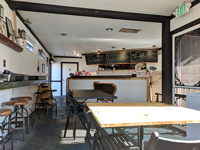 Minimalist interior, maximum flavor. The chalkboard menu promises what the aroma already confirmed: you've made an excellent decision.