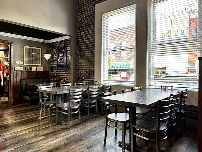 Exposed brick walls and wooden floors create that rare atmosphere where conversations flow as freely as the coffee. This isn't Instagram-bait design—it's authentic Tennessee hospitality.