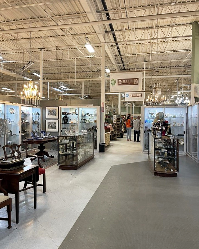 Wide aisles and gleaming display cases create a museum-like atmosphere where every turn promises a new discovery from decades past.