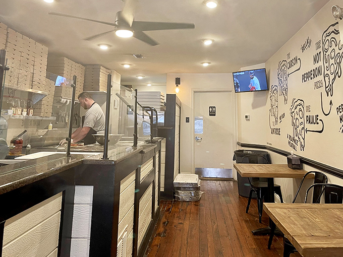 Inside, the no-frills interior with wooden tables and white brick walls lets you know they're focused on what matters&mdash;the food, not fancy decor.