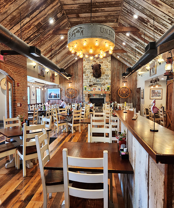 Inside, the no-frills dining room feels like a time capsule where conversations flow as freely as the coffee, and the t-shirts on display have become local souvenirs.