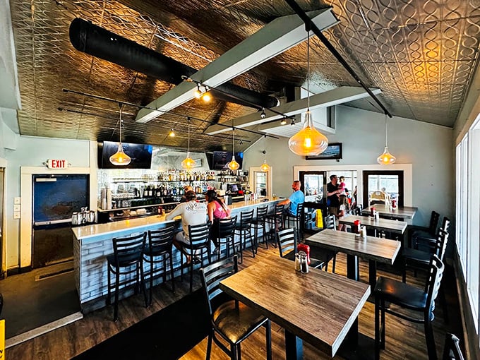 That pressed tin ceiling isn't just for show&mdash;it's bouncing the sounds of happy diners discovering why locals keep this place packed year-round.