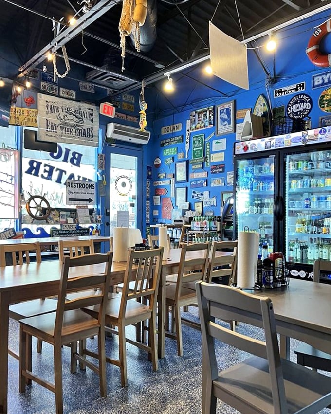 Inside, the walls tell seafood stories through maritime memorabilia while simple wooden tables promise one thing: the focus here is on your plate, not fancy chairs.