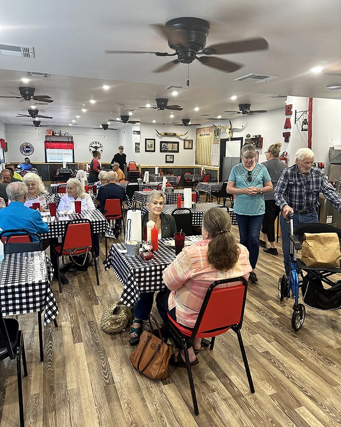 Classic black and white checkered tablecloths set the stage for comfort food theater. No fancy linens needed when the food's this good.