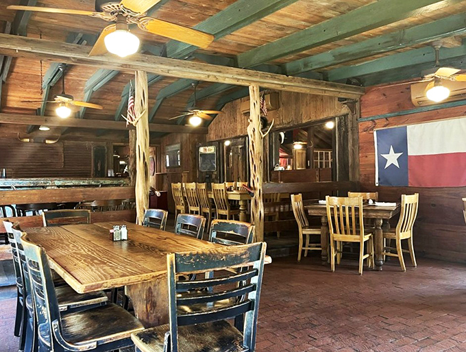 Where rustic meets refined &ndash; rough-hewn beams, wooden tables, and the Texas flag create the perfect backdrop for serious steak business.