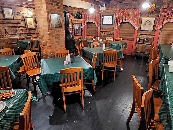 Step inside to discover the original log walls that give this landmark its name. Green tablecloths and wooden chairs create the perfect backdrop for comfort food memories.