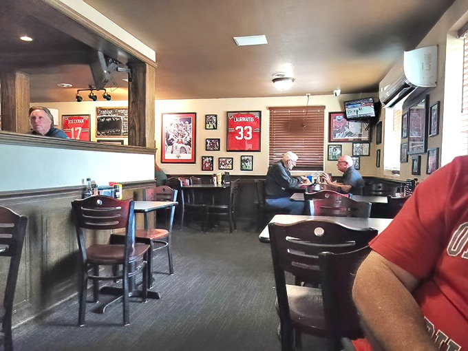 Sports memorabilia transforms this cozy dining room into a shrine where Ohio's athletic devotion is served alongside perfect patties.
