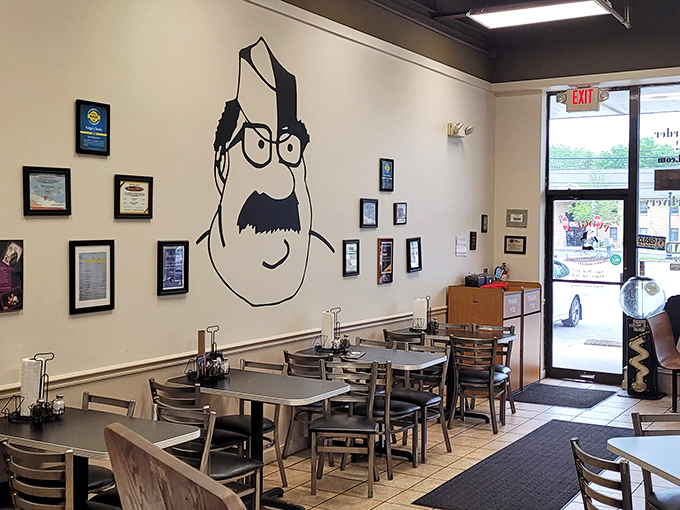 That mustachioed mascot watches over diners like a sandwich guardian angel. The simple interior says, "We put our energy into the food, not fancy lighting fixtures."
