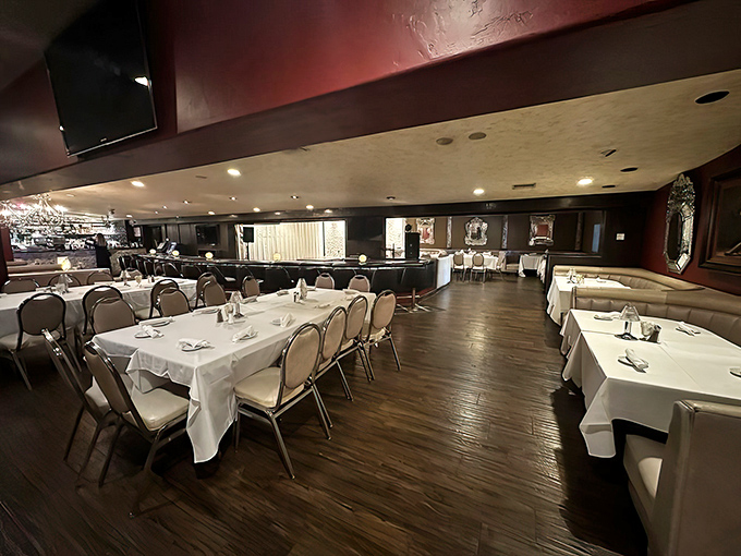 Where memories are made: crisp white tablecloths, comfortable seating, and the promise of a meal worth savoring awaits in this timeless dining room.