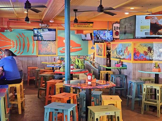 A kaleidoscope of colorful stools and marine-inspired murals creates the perfect casual vibe&mdash;because serious food doesn't need serious furniture.