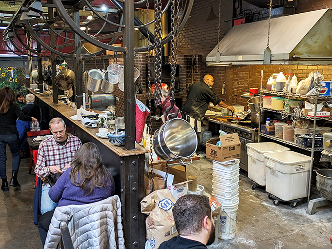 Kitchen theater at its finest! Watch the culinary magic unfold as skilled hands transform simple ingredients into Italian masterpieces in this wonderfully unpretentious open kitchen.