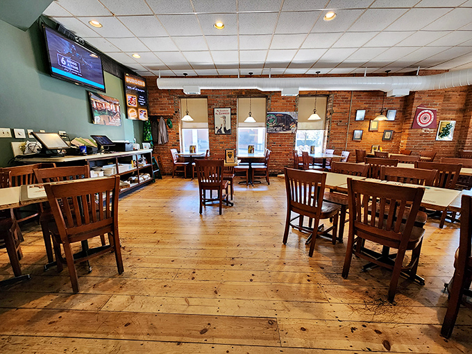 Wide-plank wooden floors that have witnessed decades of Cleveland history provide the perfect backdrop for simple, sturdy furniture that prioritizes comfort over pretension.