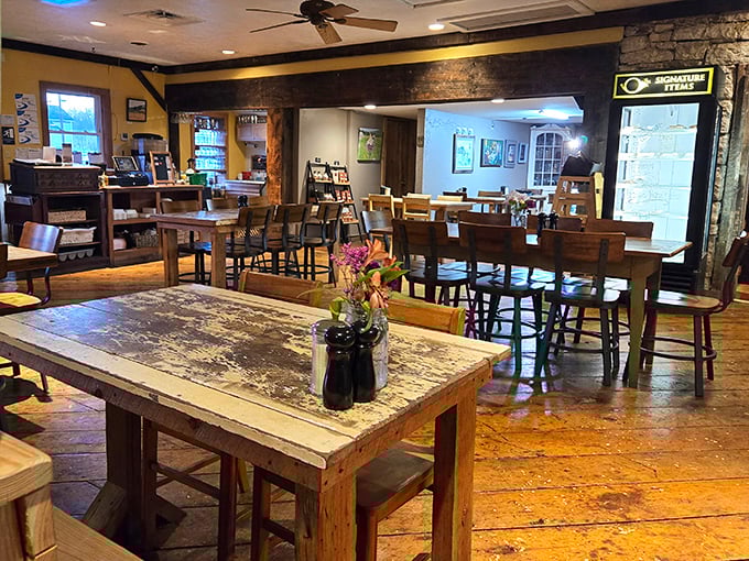 Wooden chairs, warm lighting, and the gentle hum of breakfast conversation – this dining room has hosted more morning revelations than a therapist's couch.