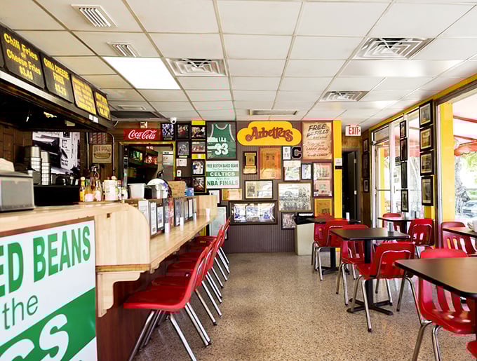 Red chairs, wood paneling, and walls filled with memories&mdash;this isn't interior design, it's hot dog history in the making.