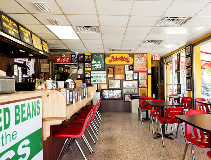 Red chairs, wood paneling, and walls filled with memories&mdash;this isn't interior design, it's hot dog history in the making.
