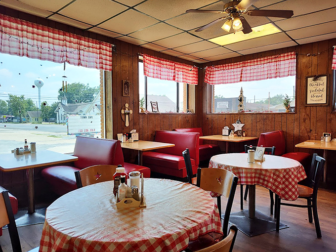 Classic red vinyl booths and checkered tablecloths create that perfect small-town ambiance where calories don't count and coffee refills are practically mandatory.