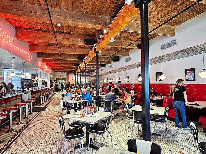 Step inside and time travel to simpler days with hexagon tile floors, red vinyl booths, and wooden ceiling beams that have witnessed decades of Nashville stories. 