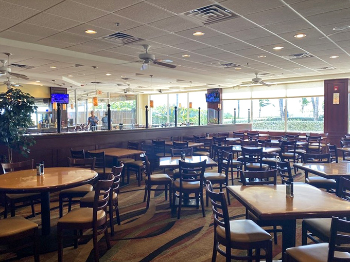 Inside, the spacious dining room offers a respite from the Florida heat. Clean lines, comfortable seating, and the promise of ocean bounty await.