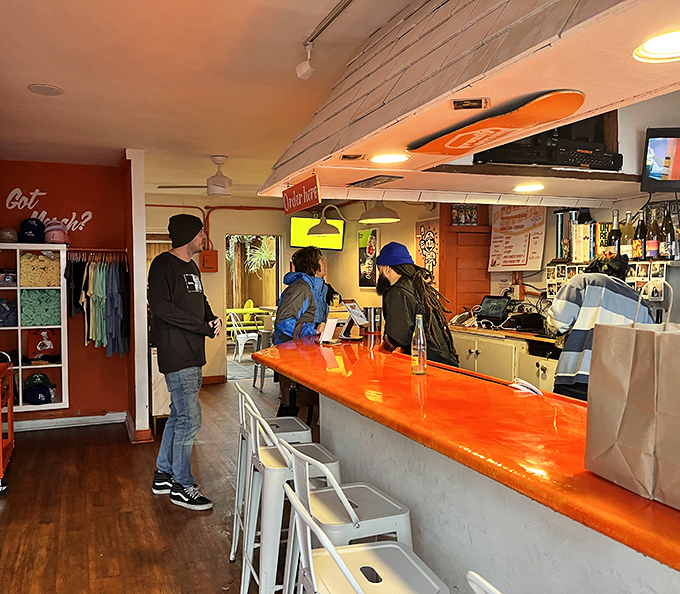 The cozy interior features an orange counter that practically glows with promise, like the burger equivalent of the bat signal.